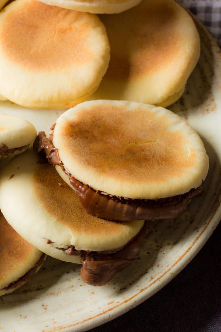 Homemade Italian Tigella bread filled with savoury ham and cheese or ...