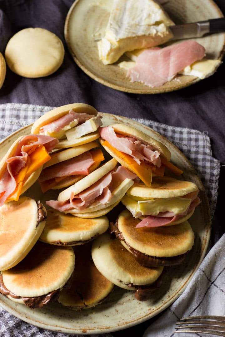 Homemade Italian Tigella bread filled with savoury ham and cheese or ...