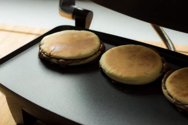 Homemade Italian Tigella bread filled with savoury ham and cheese or ...